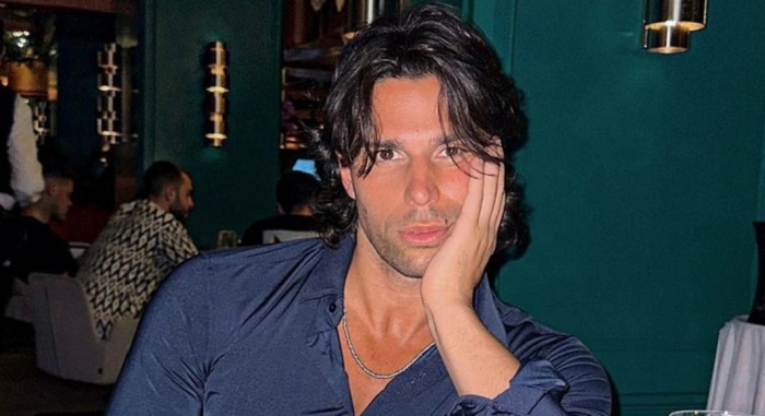 Luca Onestini arriva con la scorta per partecipare a un evento